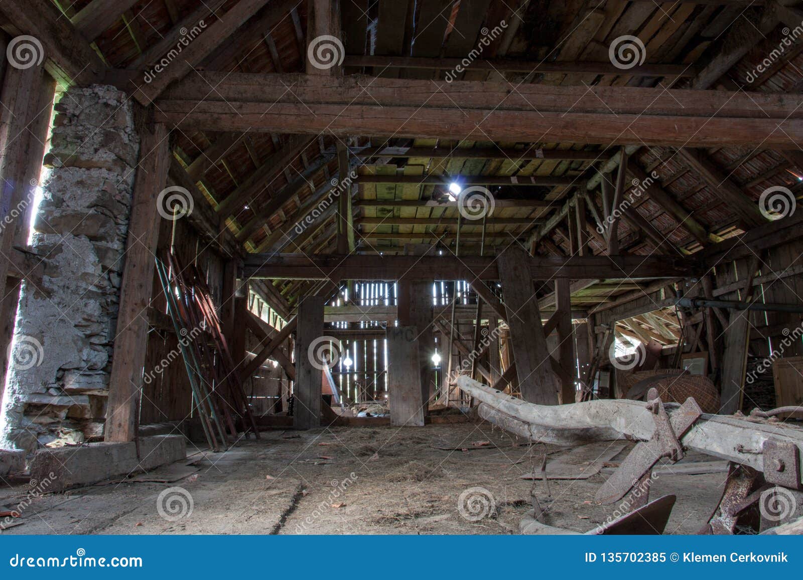 Inside of an old barn stock image. Image of stone, concrete - 135702385