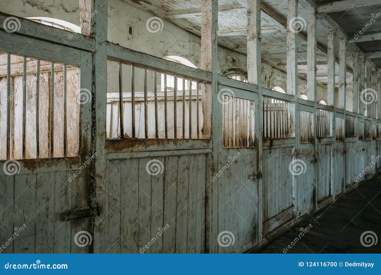 Inside Old Wooden Stable or Barn with Horse Boxes, Corridor Stock Photo ...