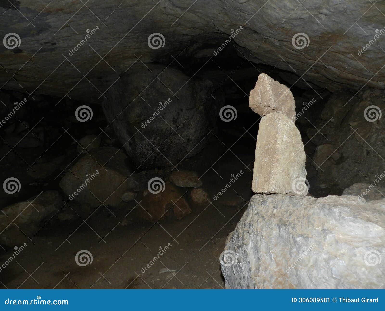 Inside a Small Cave with a Balanced Stone Tower Stock Image - Image of ...
