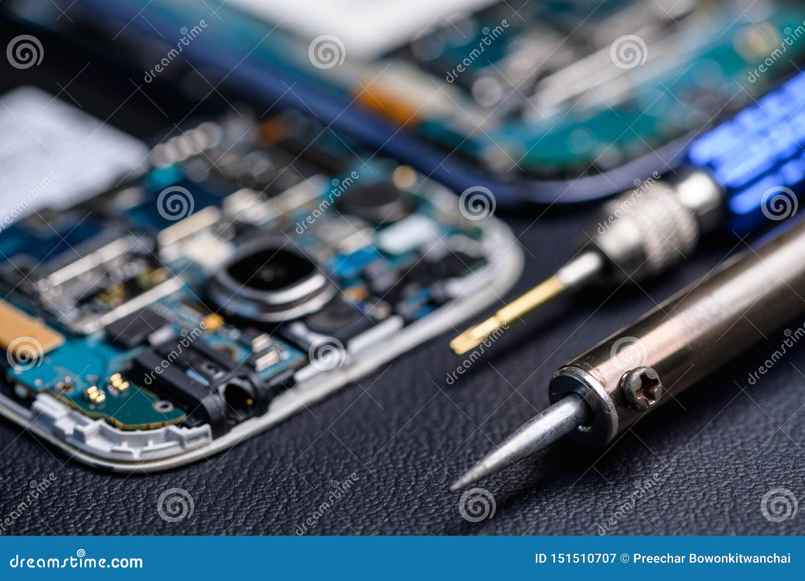 The Inside of the Smartphone`s Motherboard and Tools Lay on the Back ...