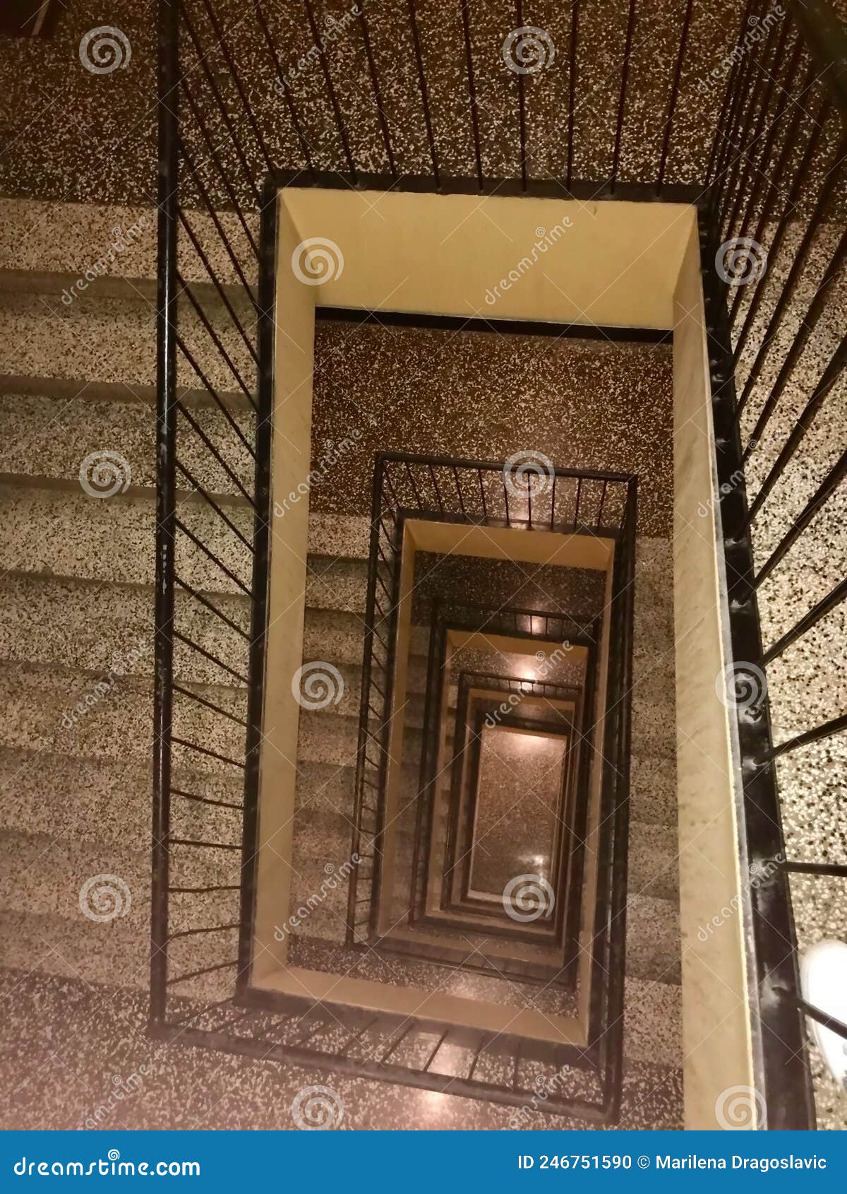 Inside stairs from above. stock photo. Image of railings - 246751590