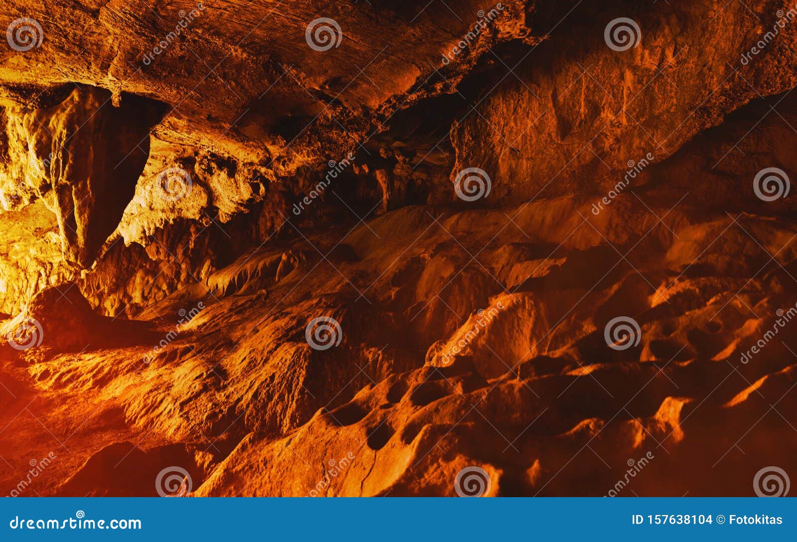 Inside stone cave of hell stock photo. Image of inferno - 157638104