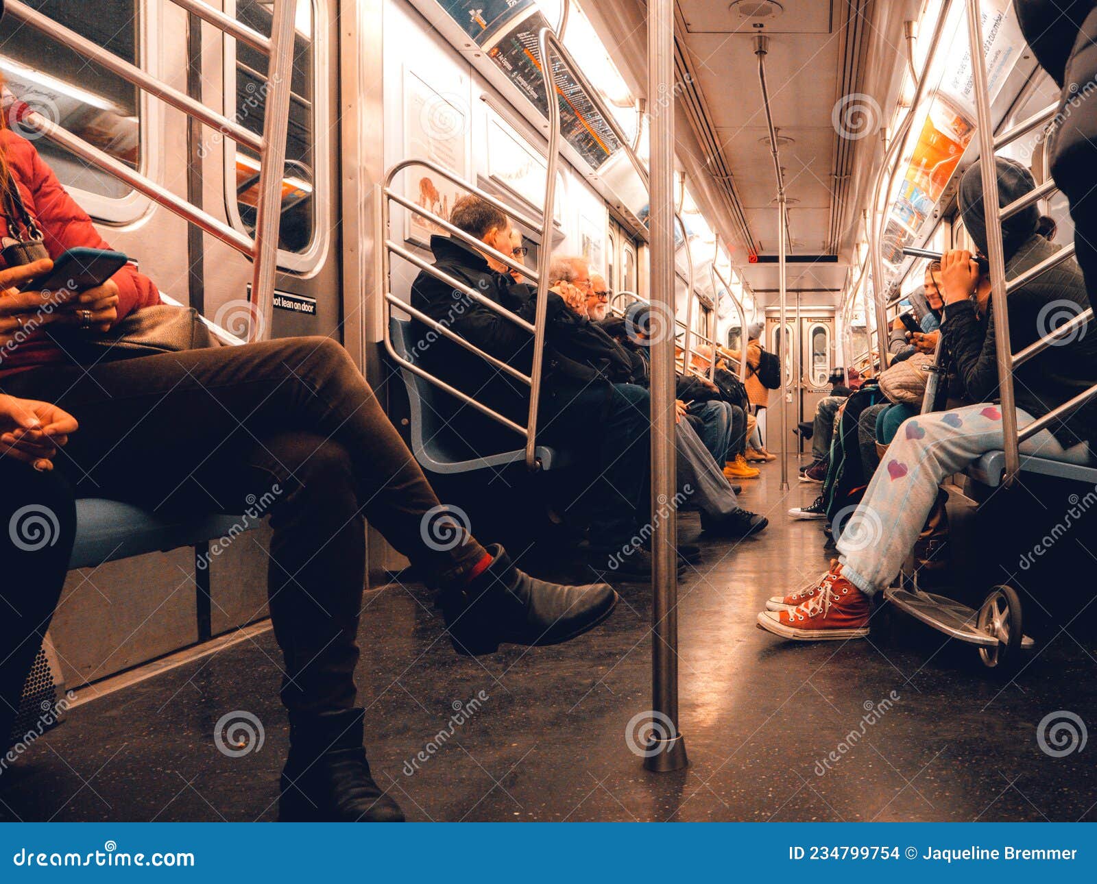 Inside a subway train editorial stock image. Image of sitting - 234799754