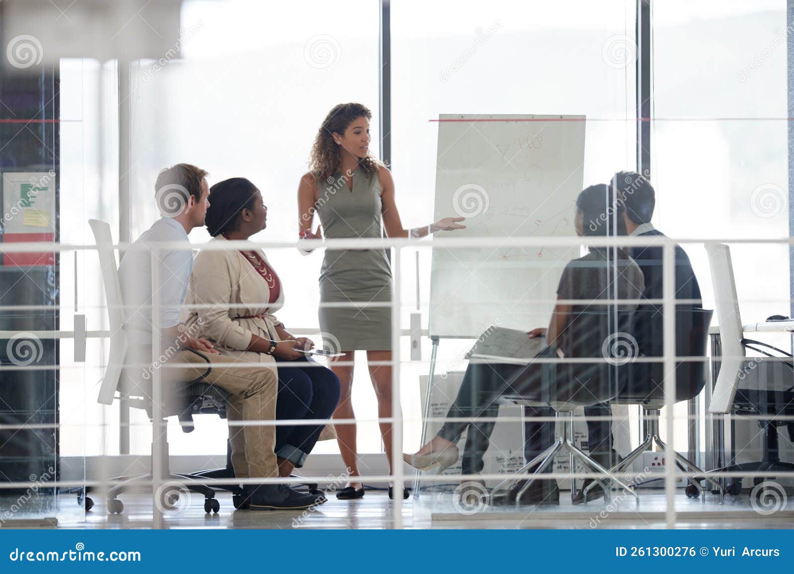 Inside the Think Tank. a Group of Colleagues Brainstorming in an Office ...