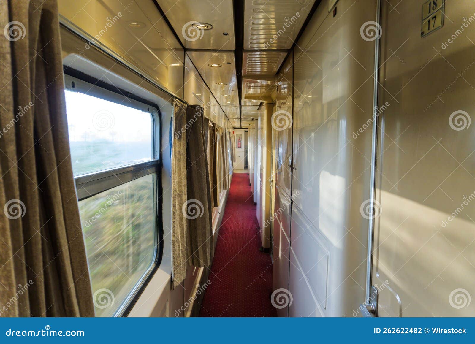 Inside of a Train with a Red Carpet and Rooms Stock Photo - Image of ...