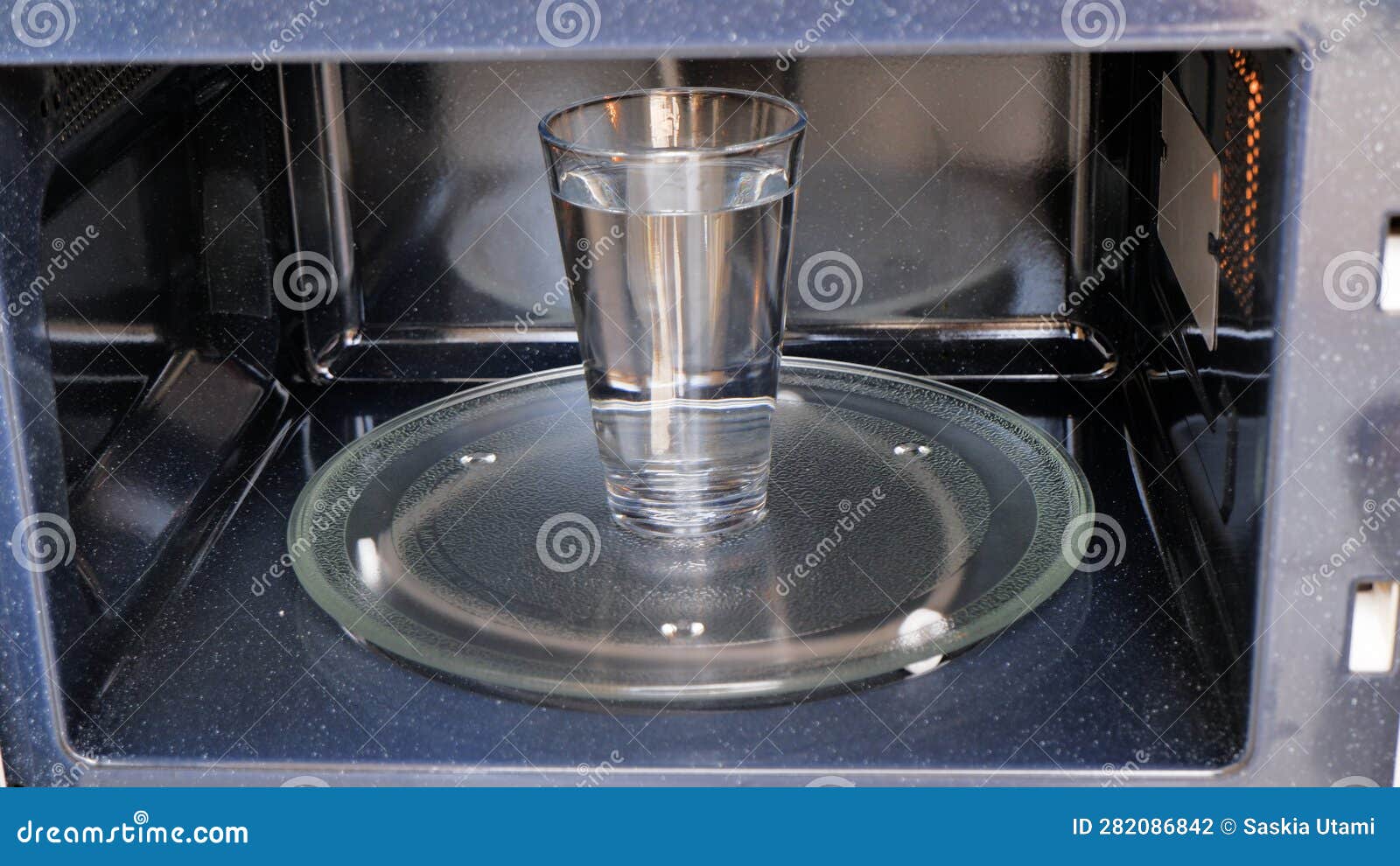 Inside View of a Glass of Water Heating in the Microwave Stock Photo ...
