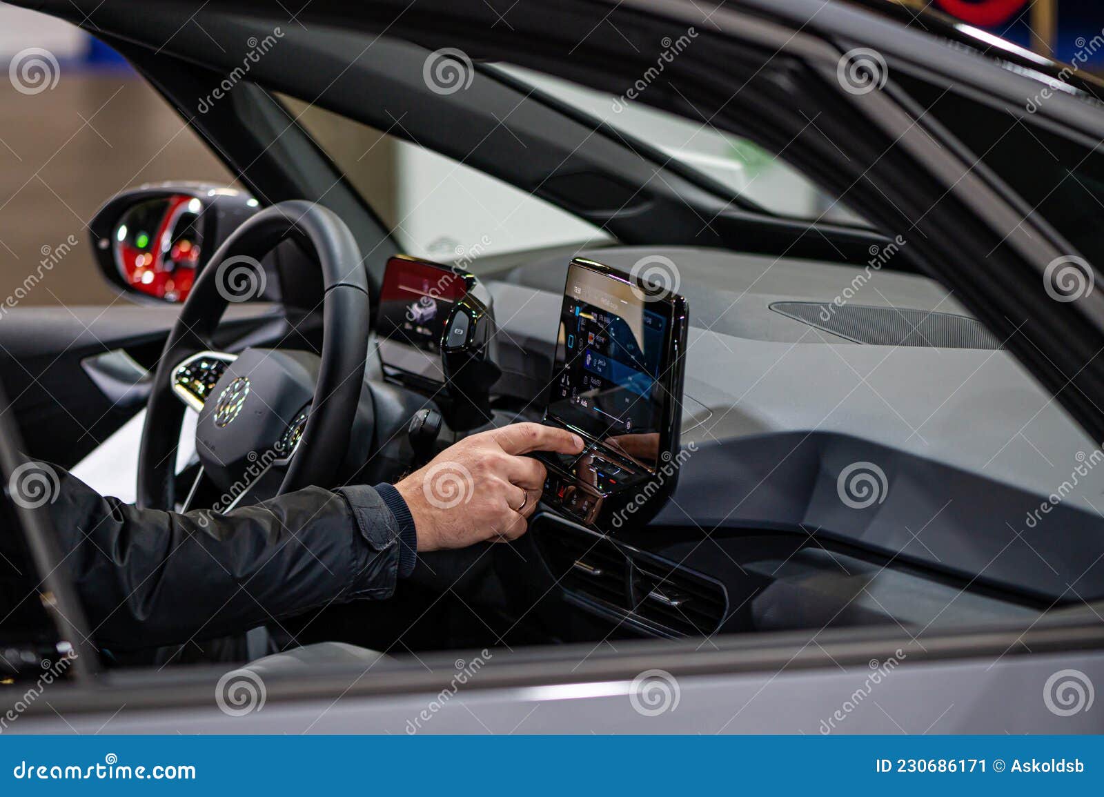 Inside View of the Volkswagen VW ID4 Electric Car, Driver Setting Up ...