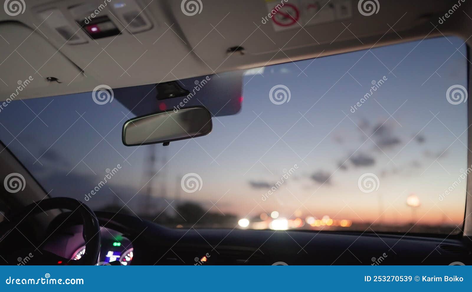 Inside View of the Windshield of a Car that is Driving Along the ...