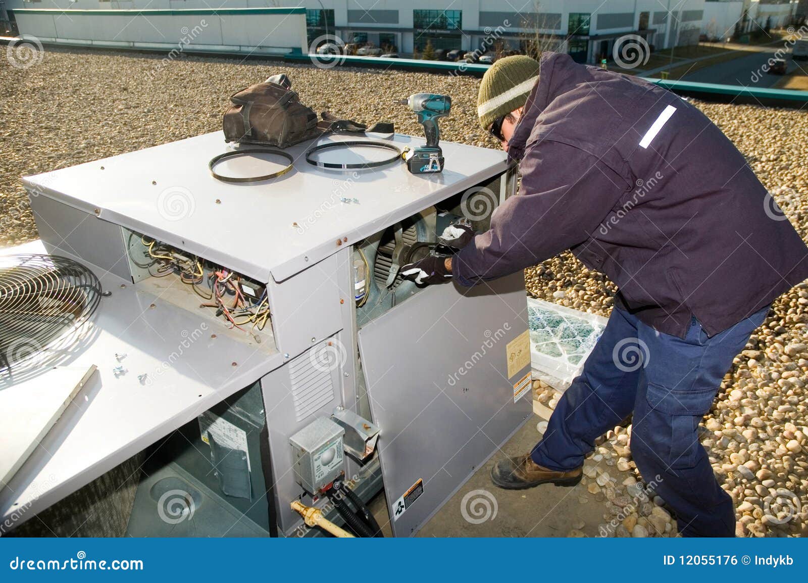 Inspecting roof top unit stock photo. Image of exchange - 12055176