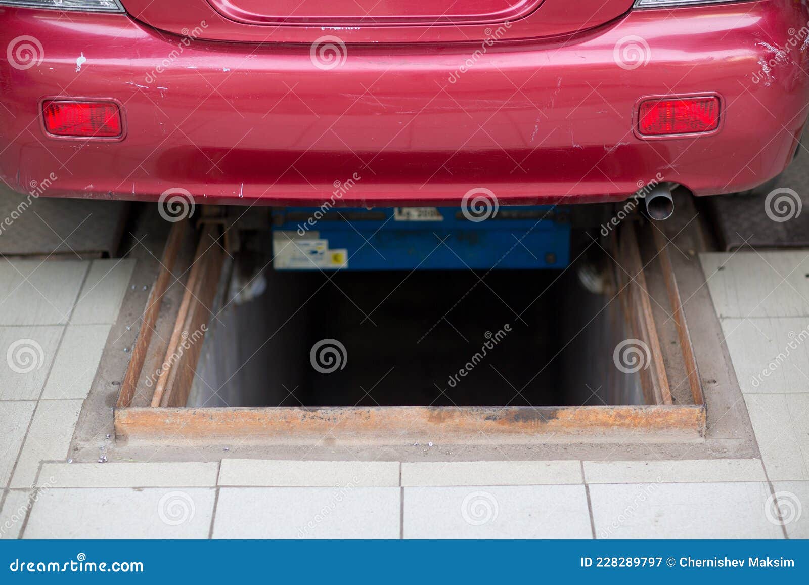 Inspection Pit in the Garage and Red Car Stock Image - Image of garage ...