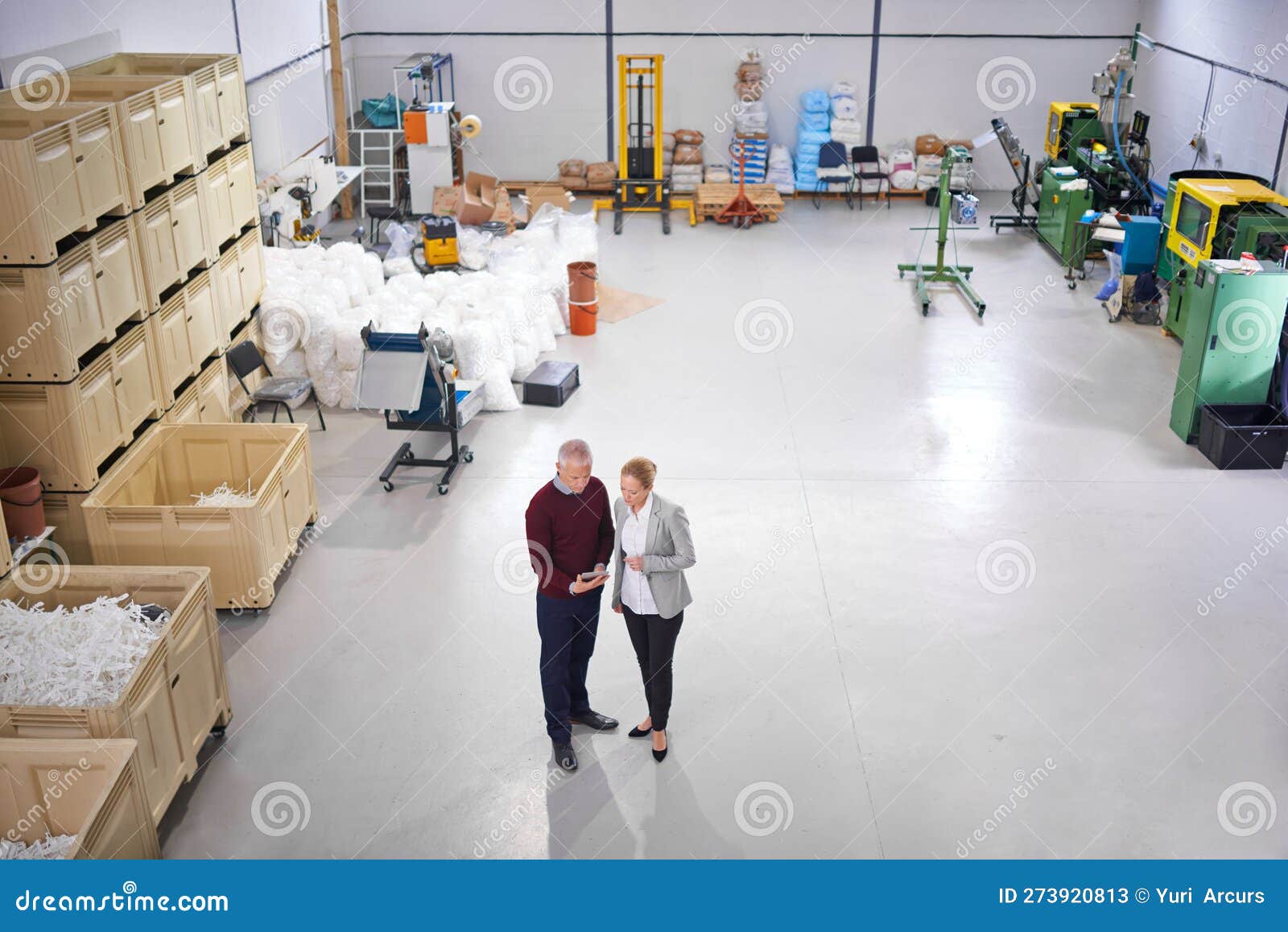 Inspection in Progress. High Angle Shot of Two Factory Managers Using a ...