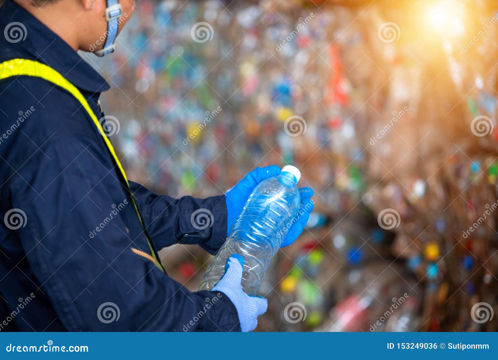 Inspection of Waste Plastic Water Bottles Stock Photo - Image of blur ...