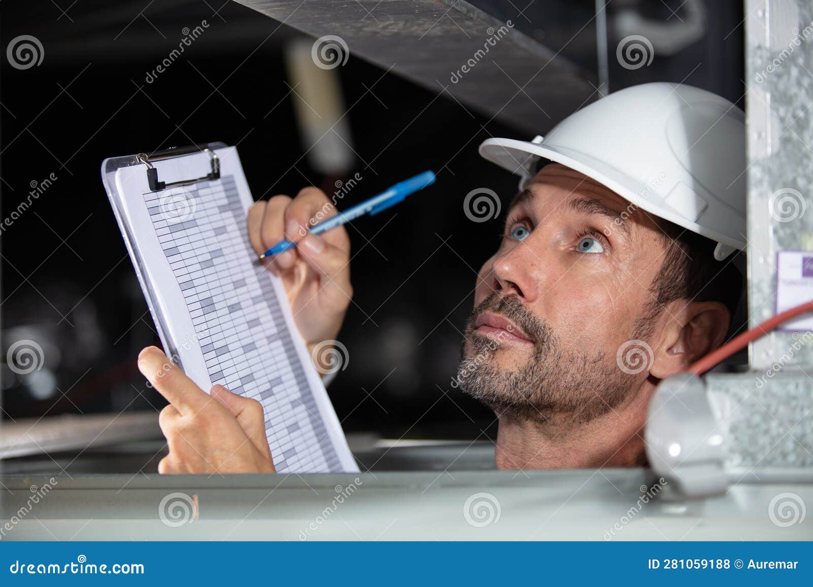 Inspector Checking Structure and Taking Note in Clipboard Stock Photo ...