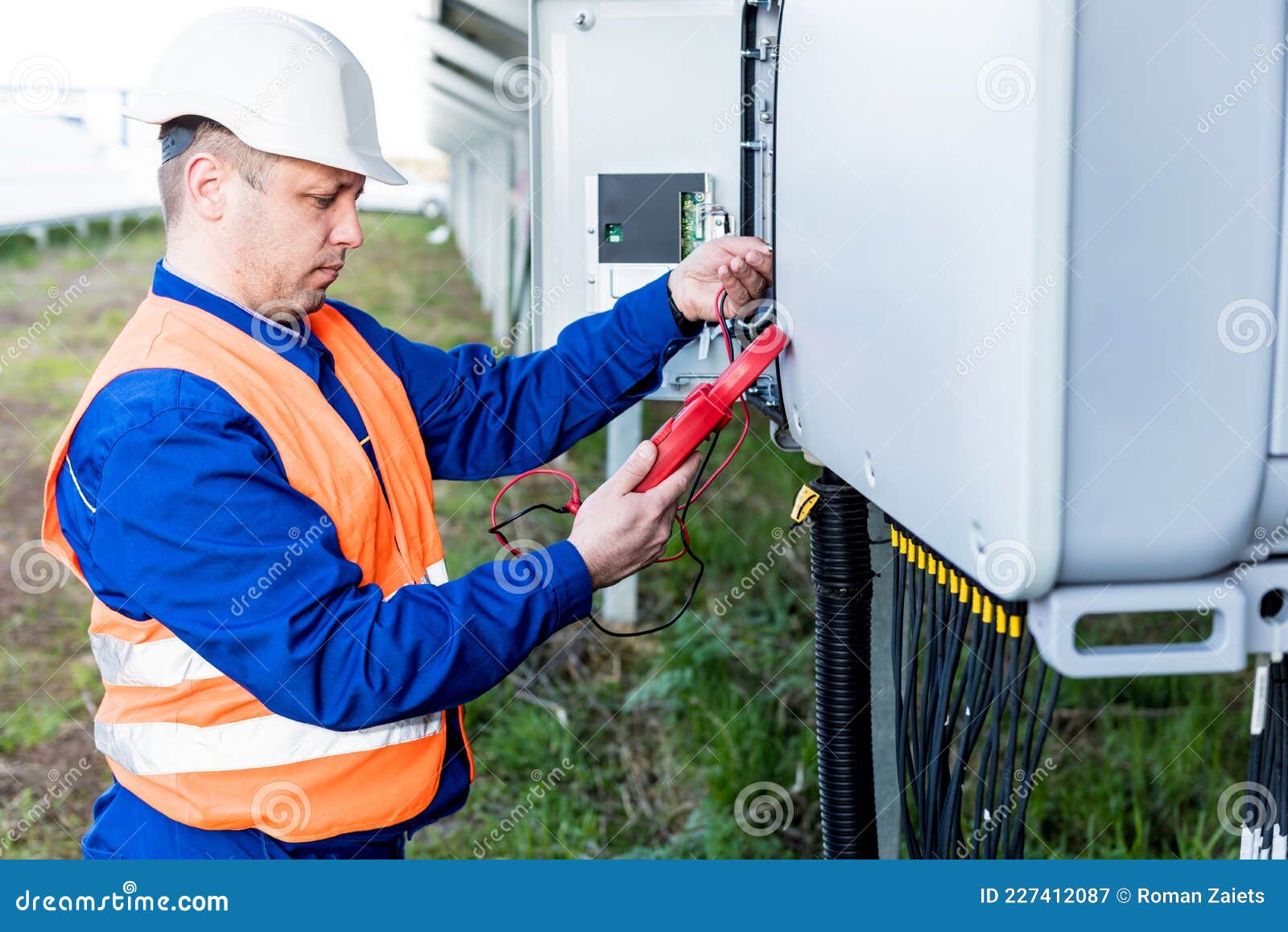 The Inspector Checks the Actual Output Voltage Level of Inverter Stock ...