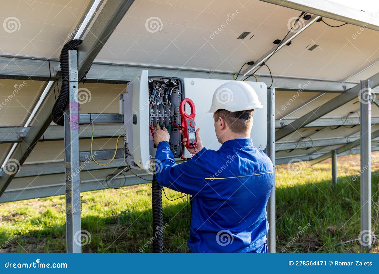 The Inspector Checks the Actual Output Voltage Level of Inverter Stock ...