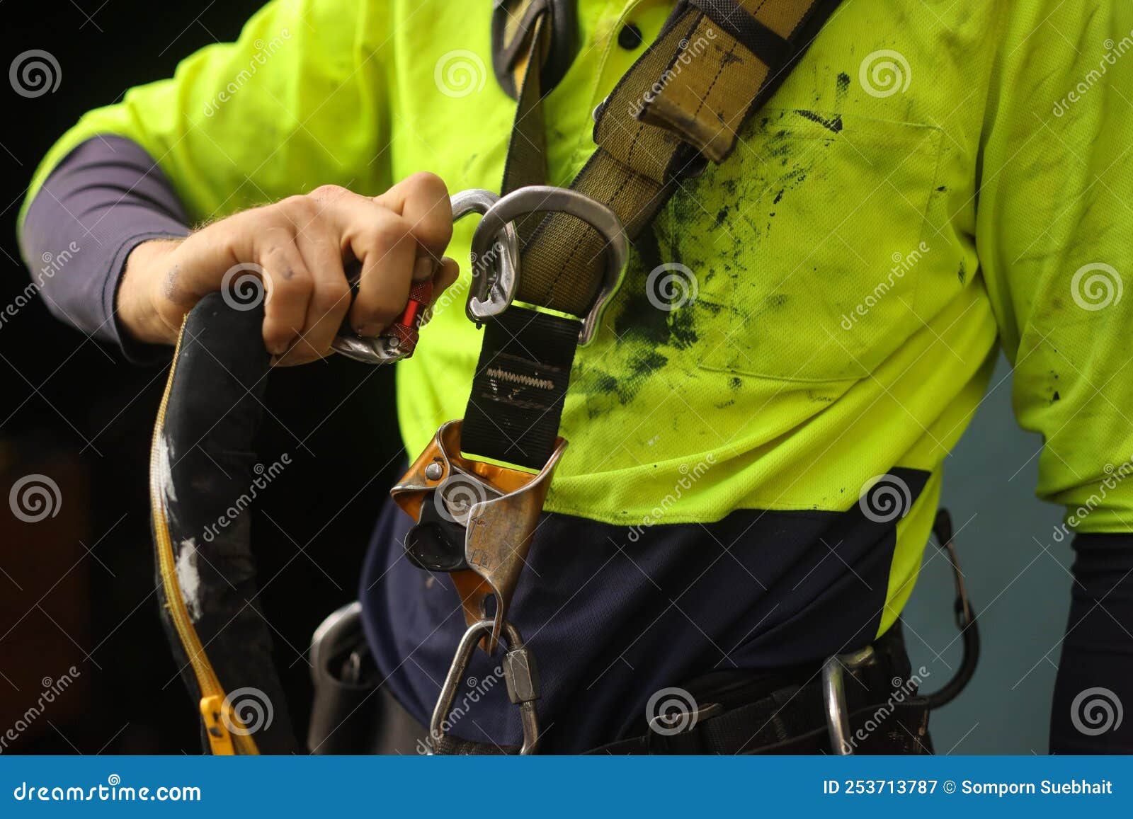 Inspector Clipping Locking Karabiner into Front of Full Body Safety ...