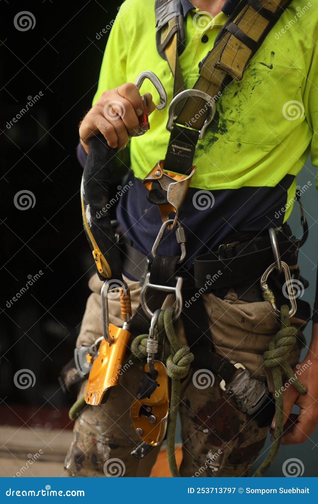 Inspector Clipping Locking Karabiner into Front of Full Body Safety ...