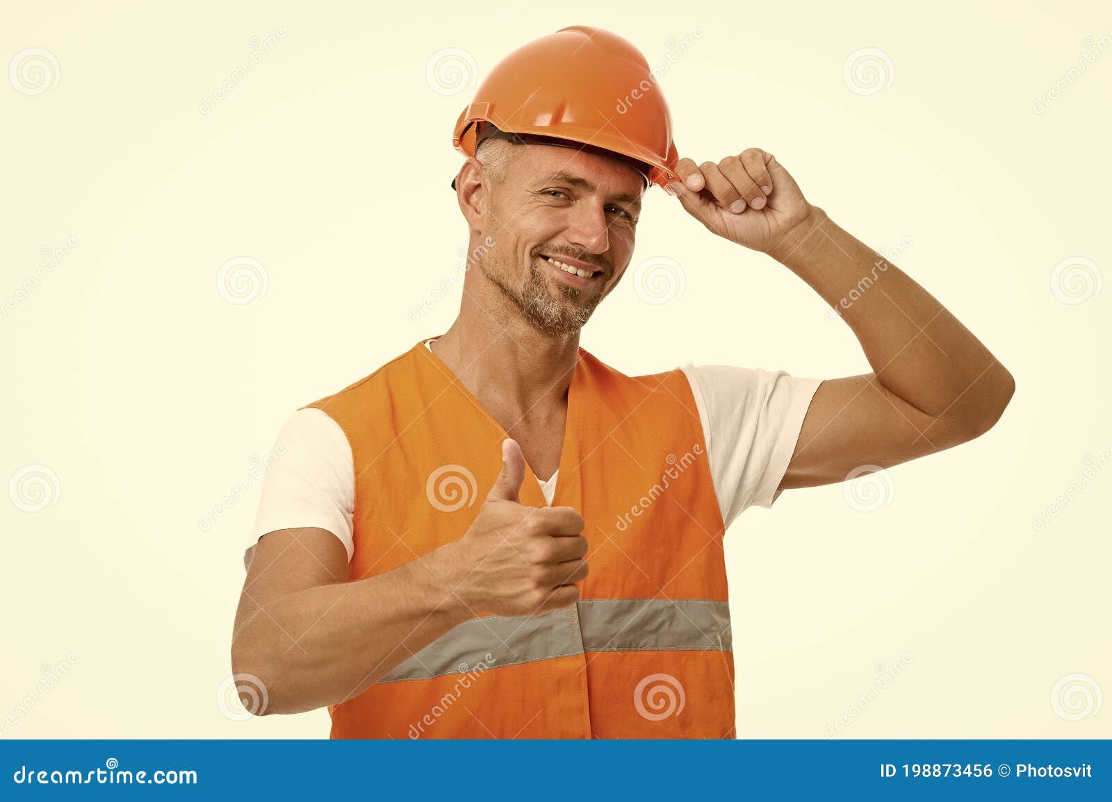 Oil Inspector In Protective Overalls And Orange Helmet Making Notes ...