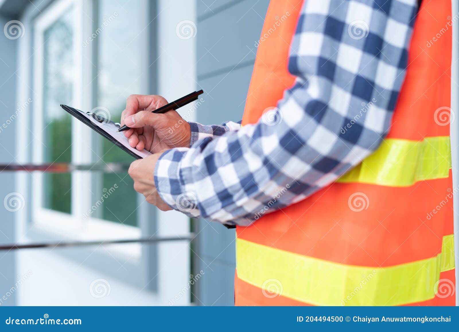 The Inspector or Engineer is Checking the Building Structure and House ...