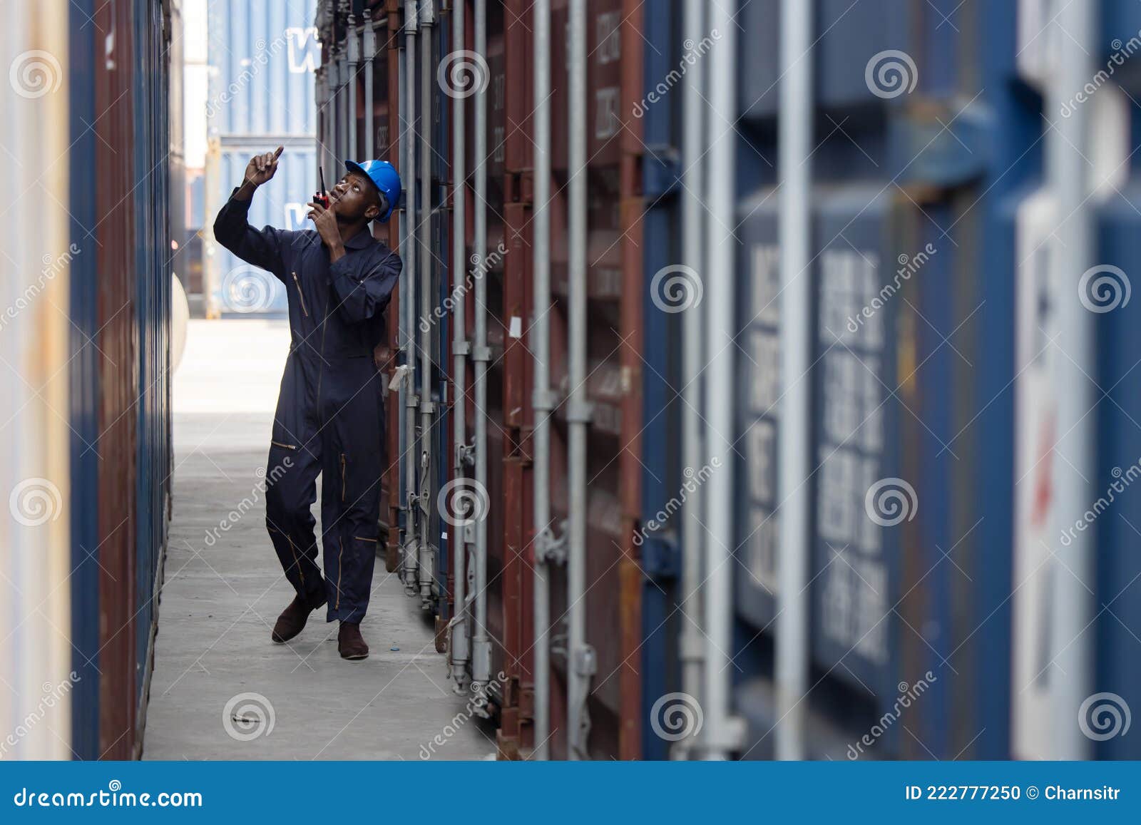 Black Inspector Inspecting The Containers At The Port Royalty-Free ...