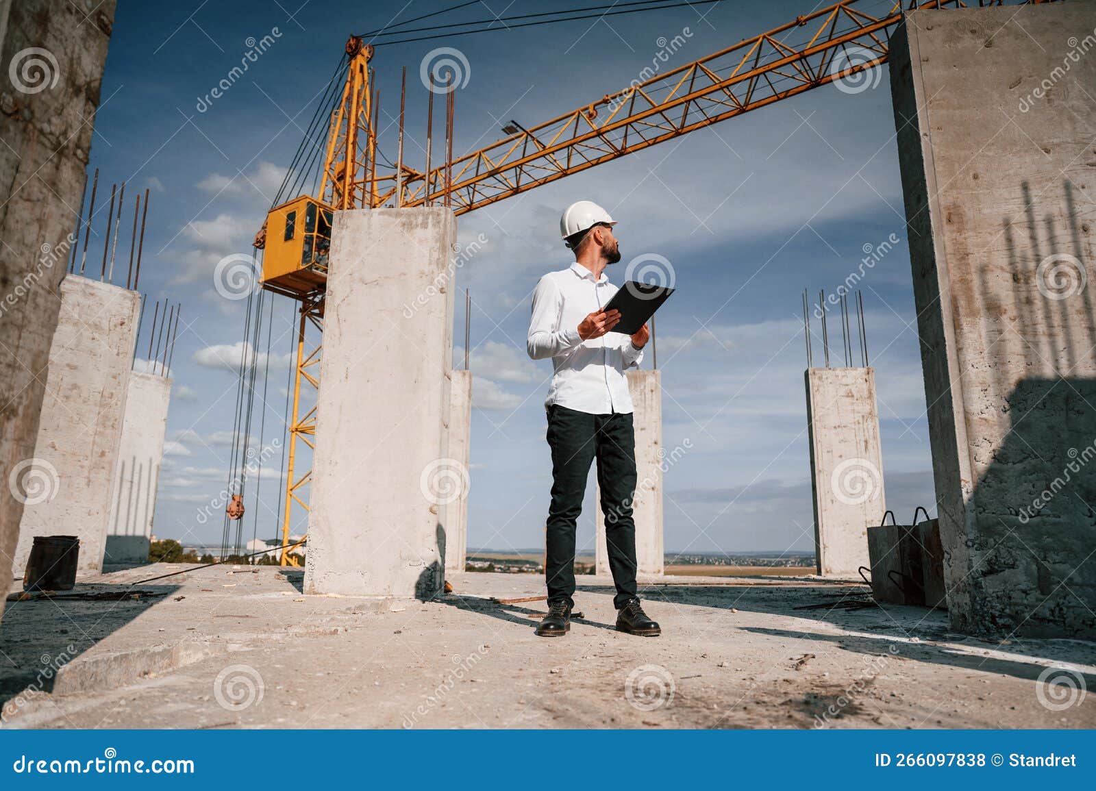 Inspector with Notepad is Standing on the Construction Site Stock Photo ...