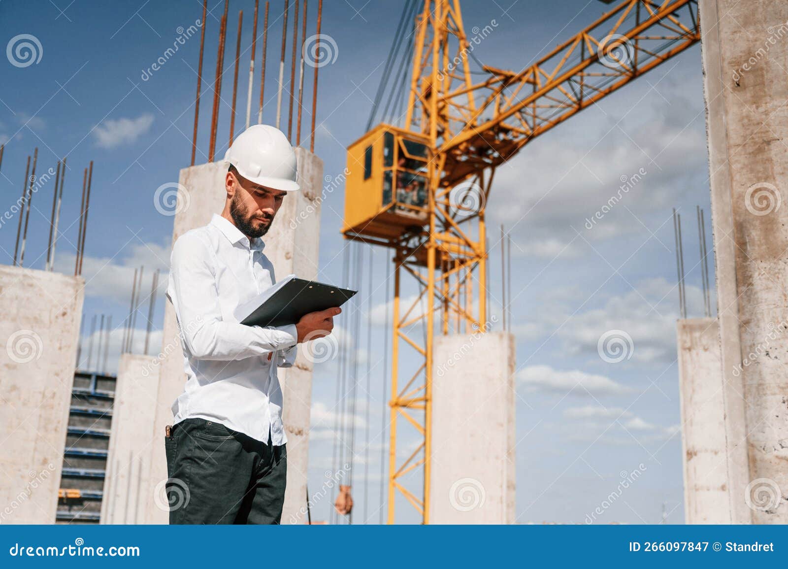 Inspector with Notepad is Standing on the Construction Site Stock Image ...