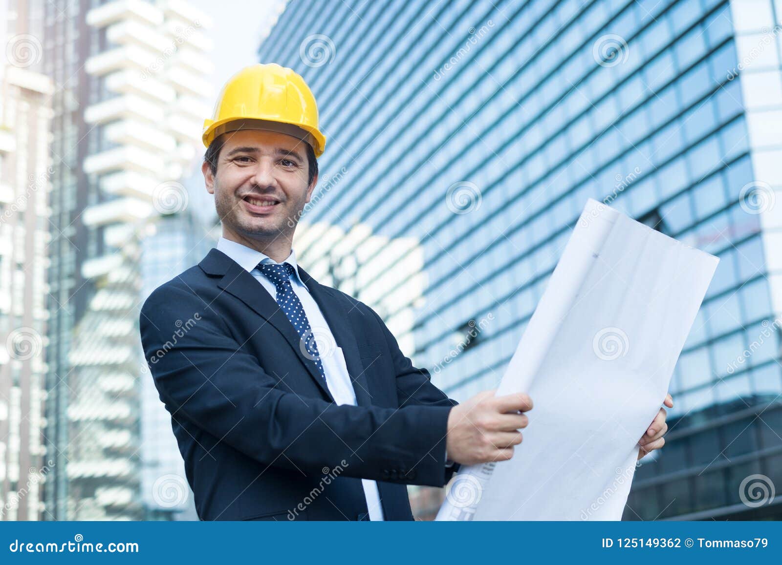Inspector on Site Construction of High Modern Buildings Stock Photo ...