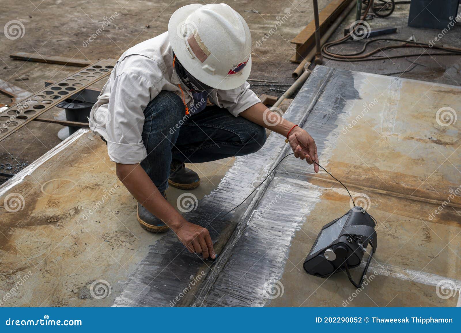 The Inspectors are Checking Defect in Welded of Steel Plate Add Joint ...