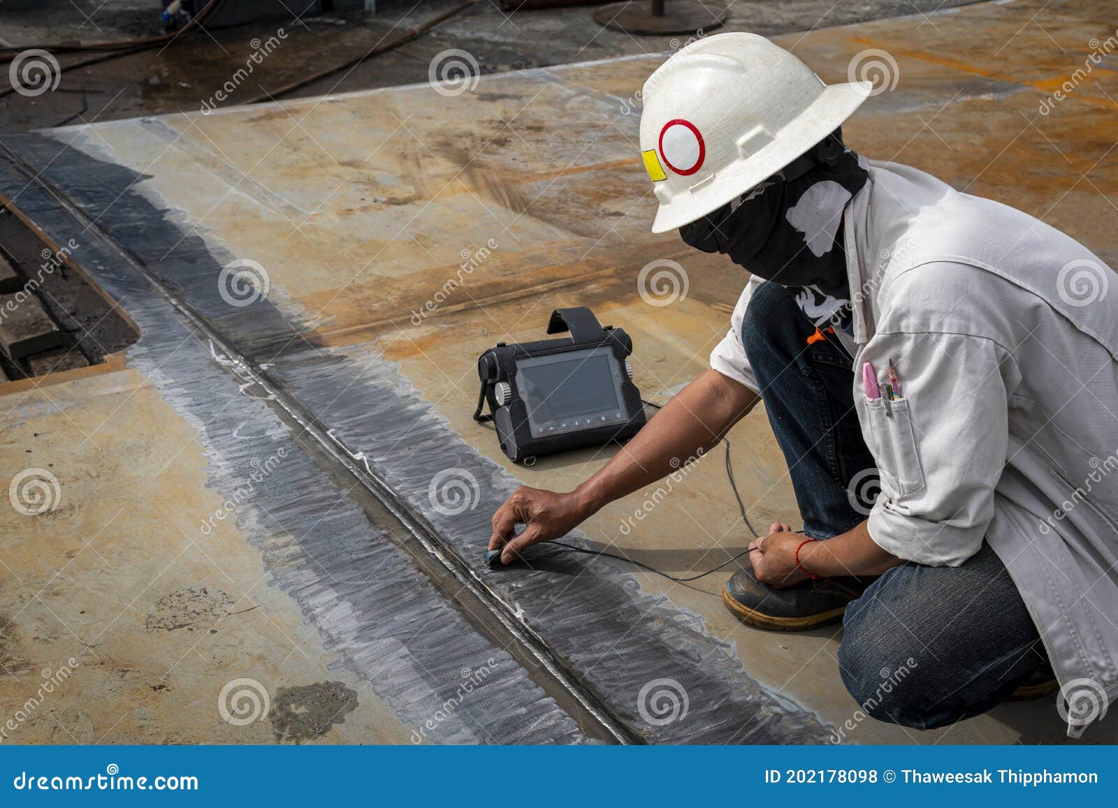 The Inspectors are Checking Defect in Welded of Steel Plate Add Joint ...