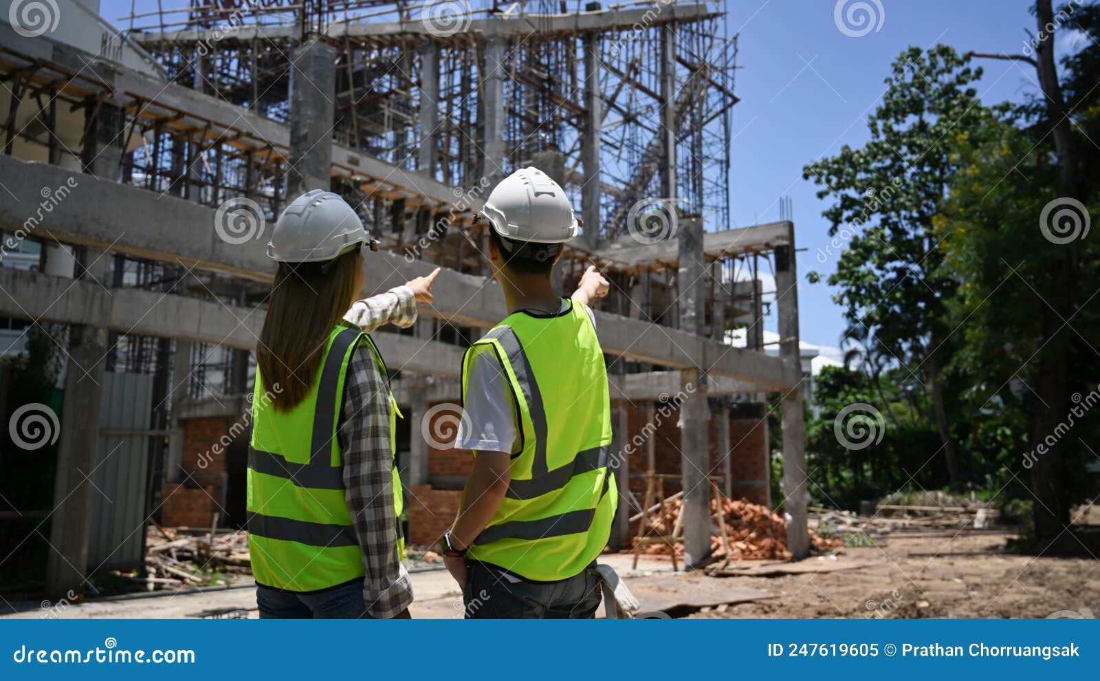 Inspectors and Head Engineer Working Together at Construction Site ...