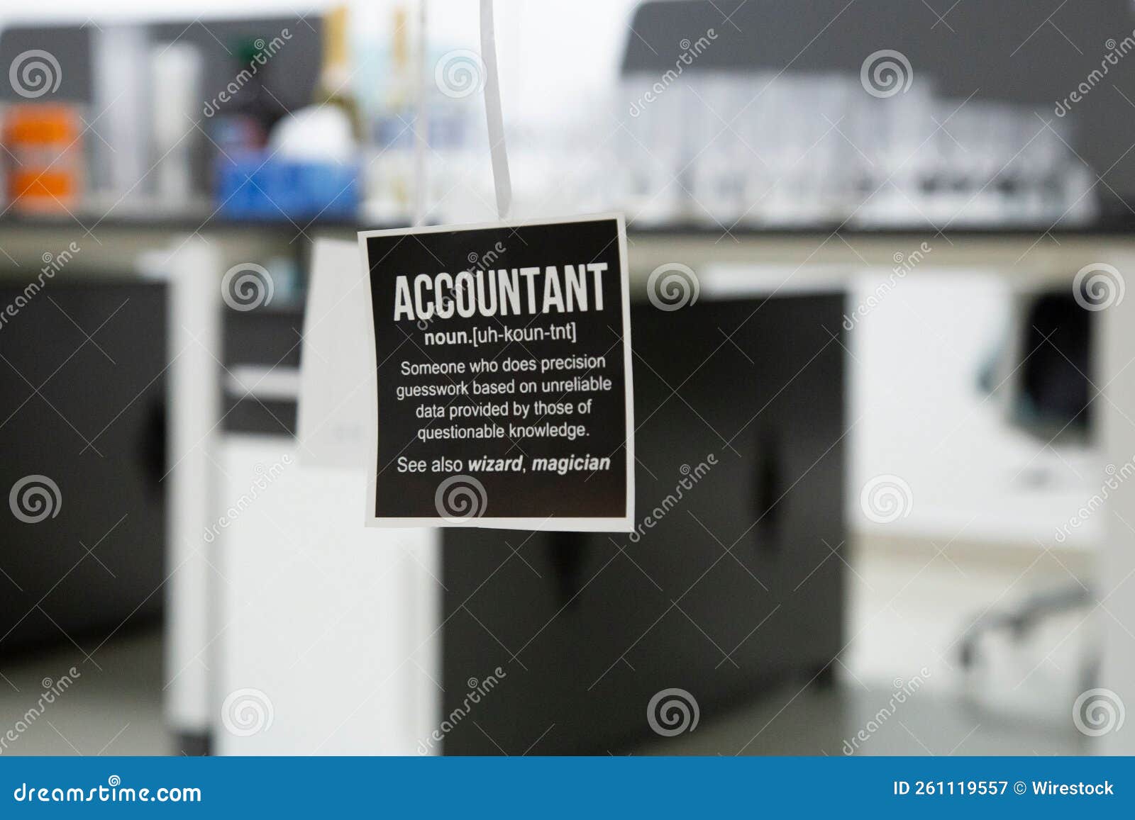 Accountant Quote Hanging on a String Out of Focus with Grain Stock ...