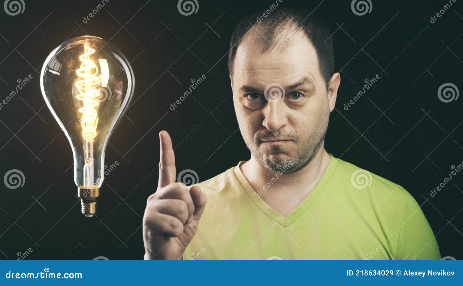 Inspired Man and Big Shining Light Bulb. Insight or Idea Concepts Stock ...