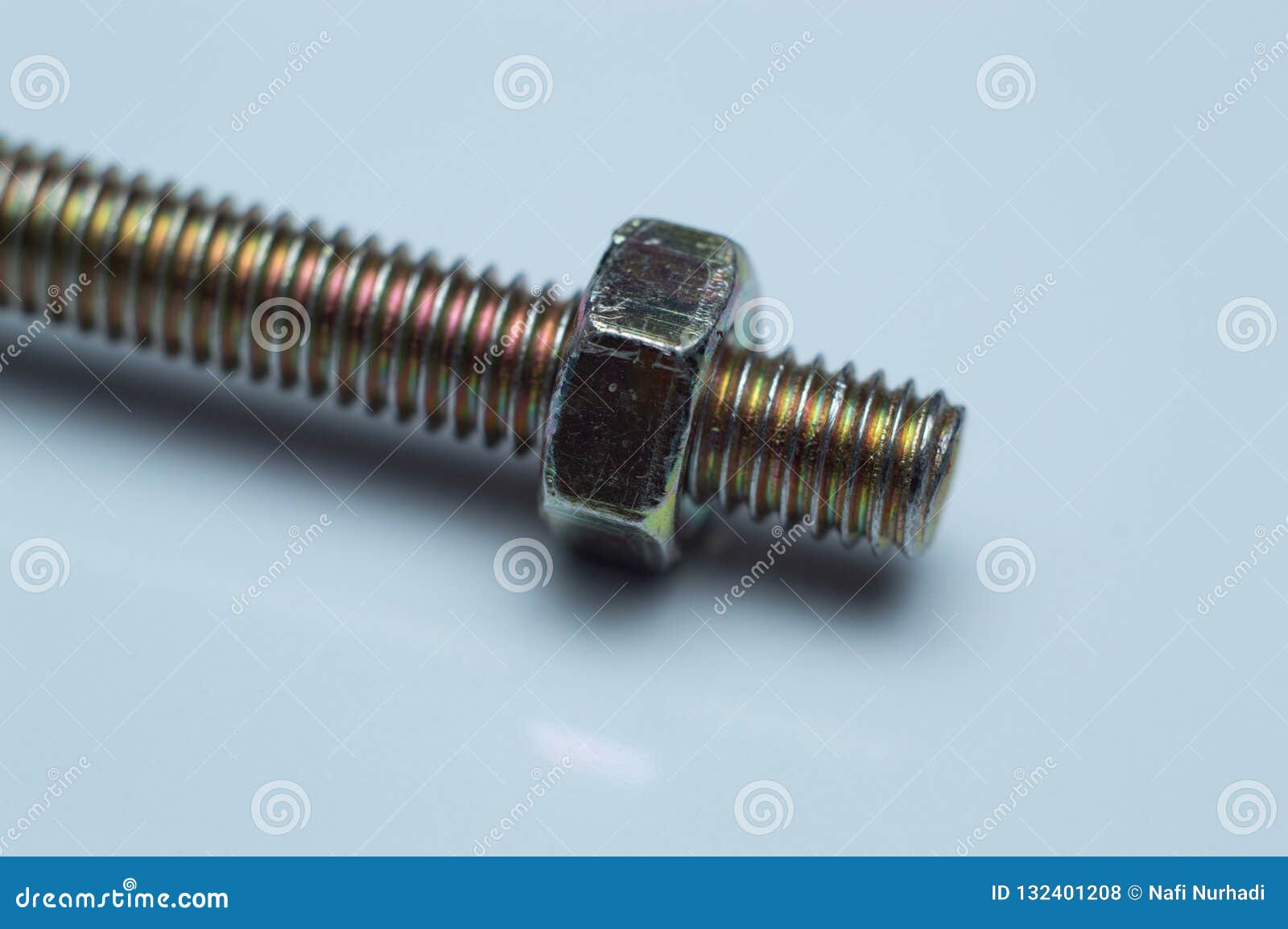 Install nut on bolt stock photo. Image of industrial - 132401208