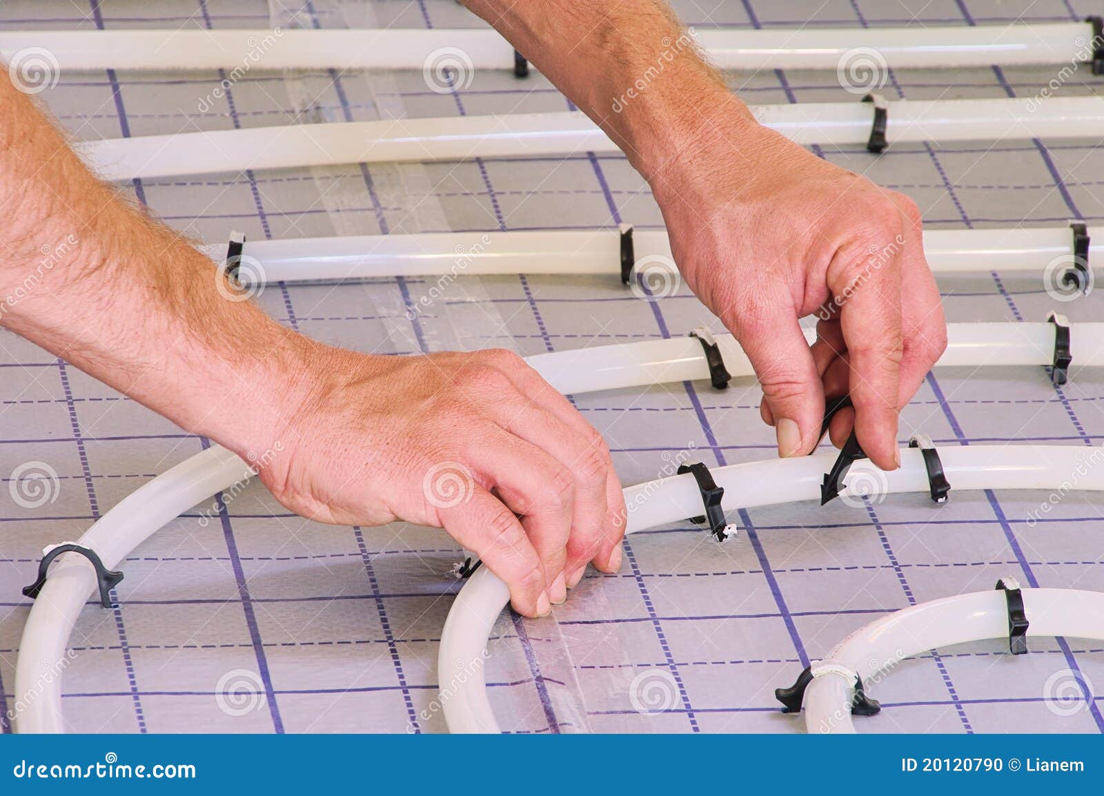 Install under slab heating stock photo. Image of plumber - 20120790