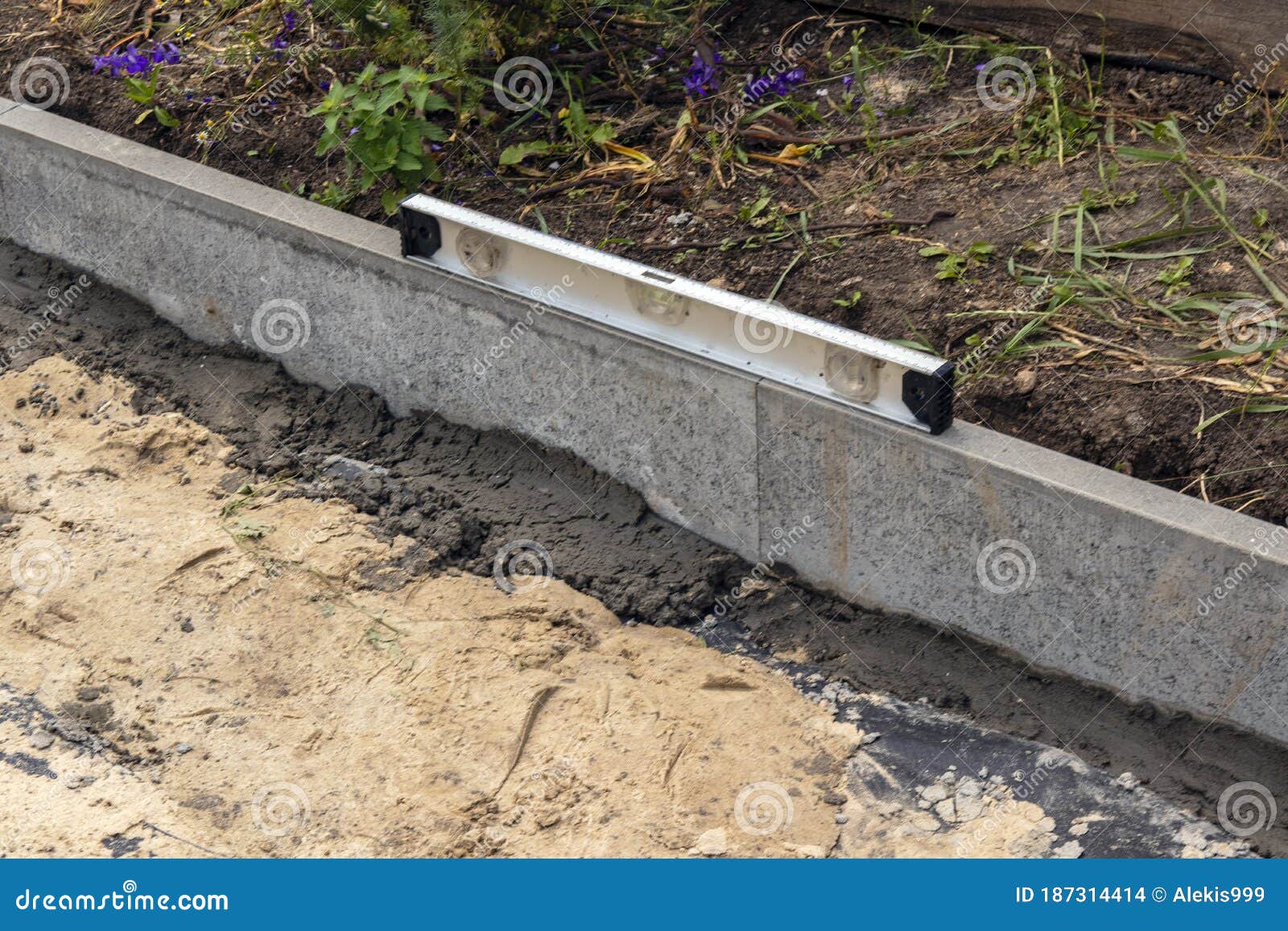 Installation of Boundary Limiters. Installation of Curbs in Semi-dry ...