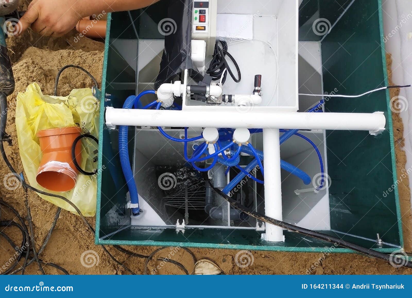 Installation and Connection of the Sump To the Mains Stock Photo ...