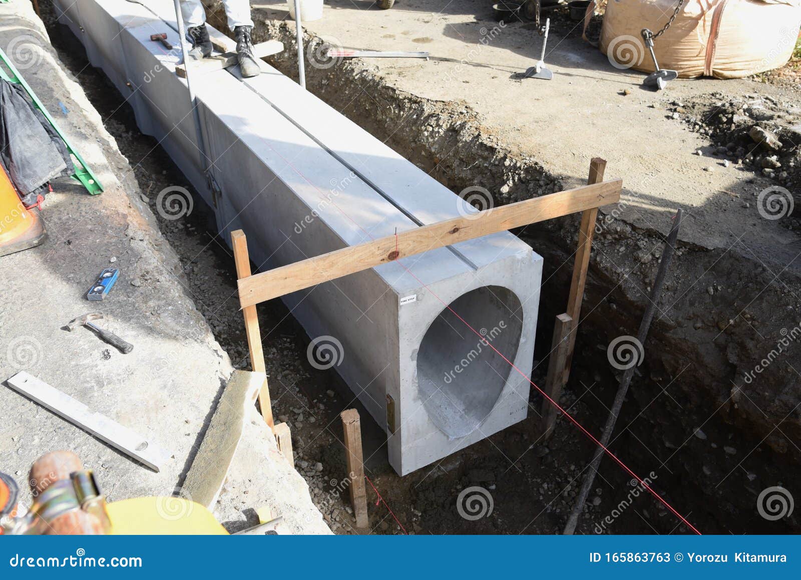 Installation Construction of Street Gutter on the Road Stock Image ...