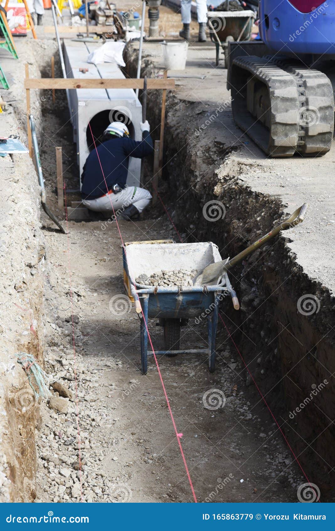 Installation Construction of Street Gutter on the Road Stock Image ...