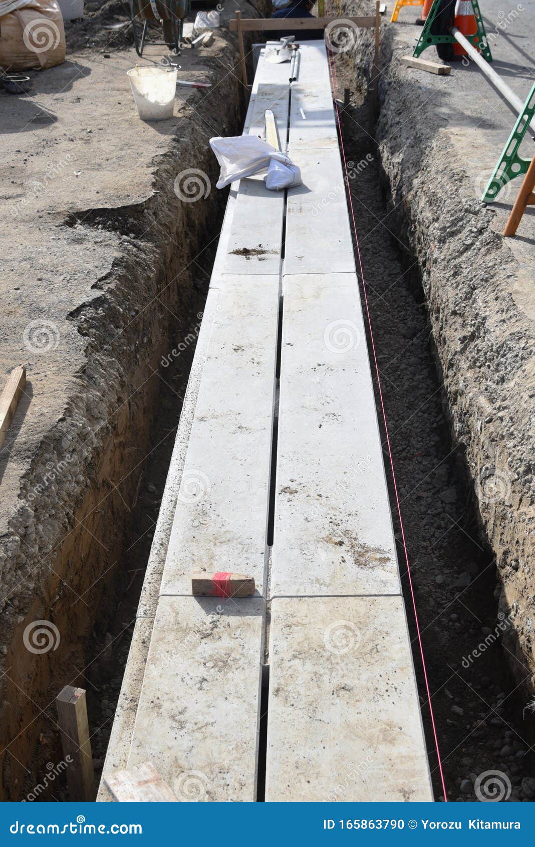 Installation Construction of Street Gutter on the Road Stock Photo ...