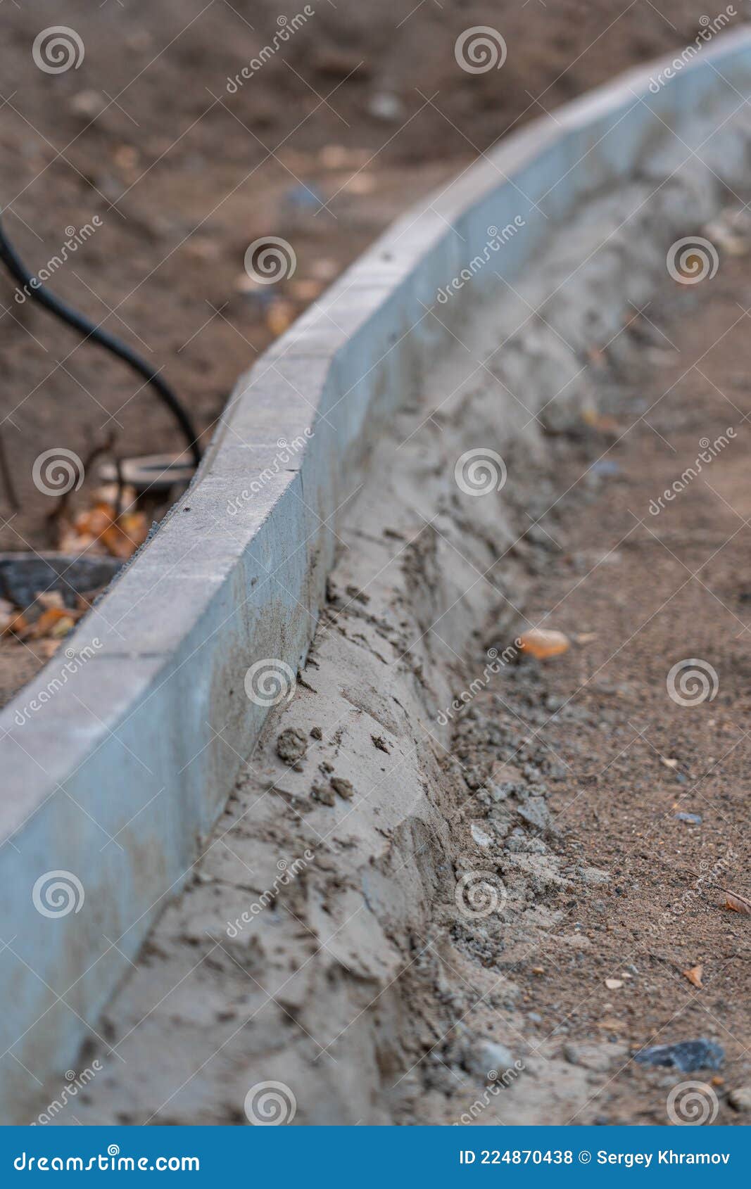 Installation of Curbs at the Construction Site. Curved Line Road Curb ...
