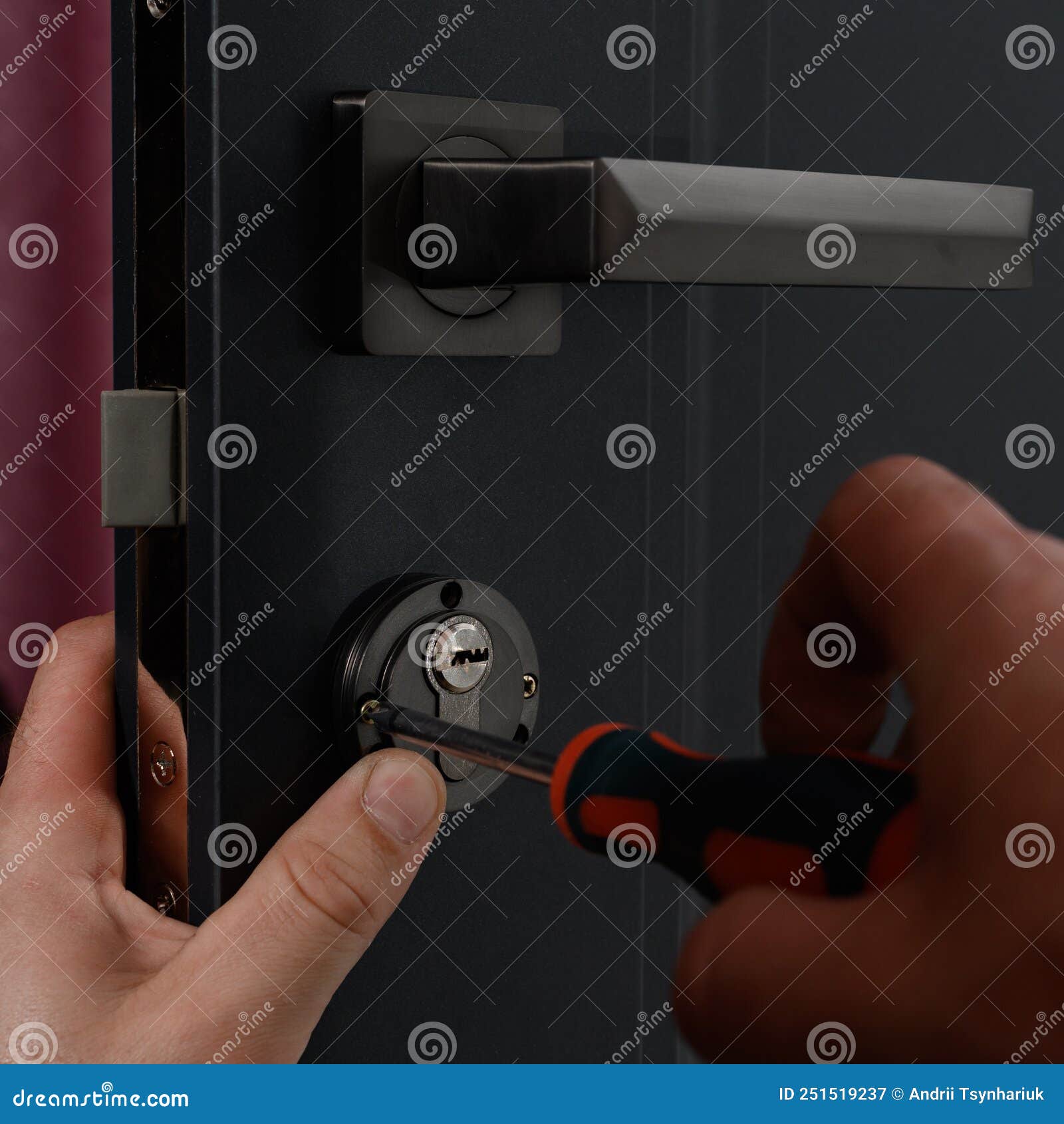 Installation of a Door Lock, a Carpenter Installs a Door Lock in a Door ...