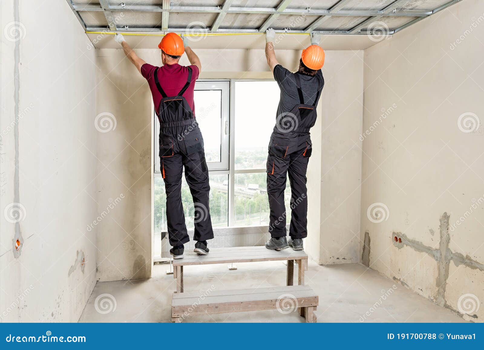 Installation of Drywall. Workers are Measuring Stock Photo - Image of ...