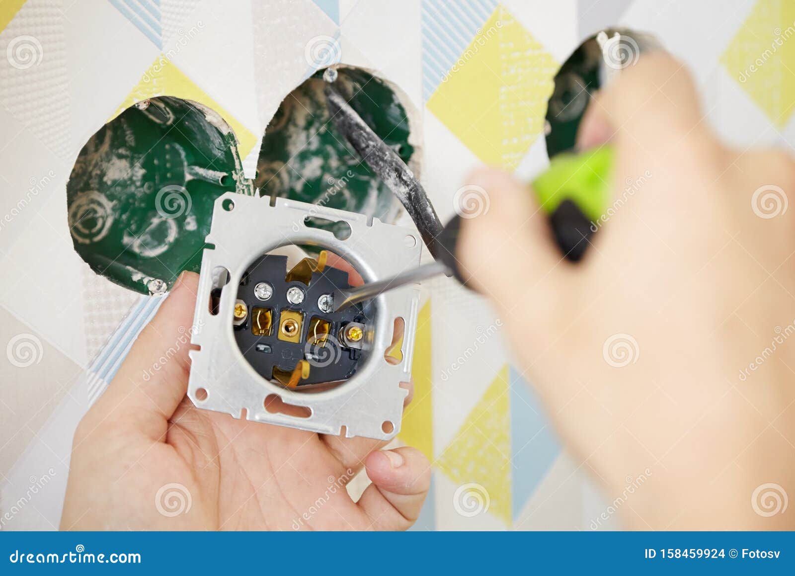 Installation of an Electrical Outlet, Work with an Electric Cable Stock ...