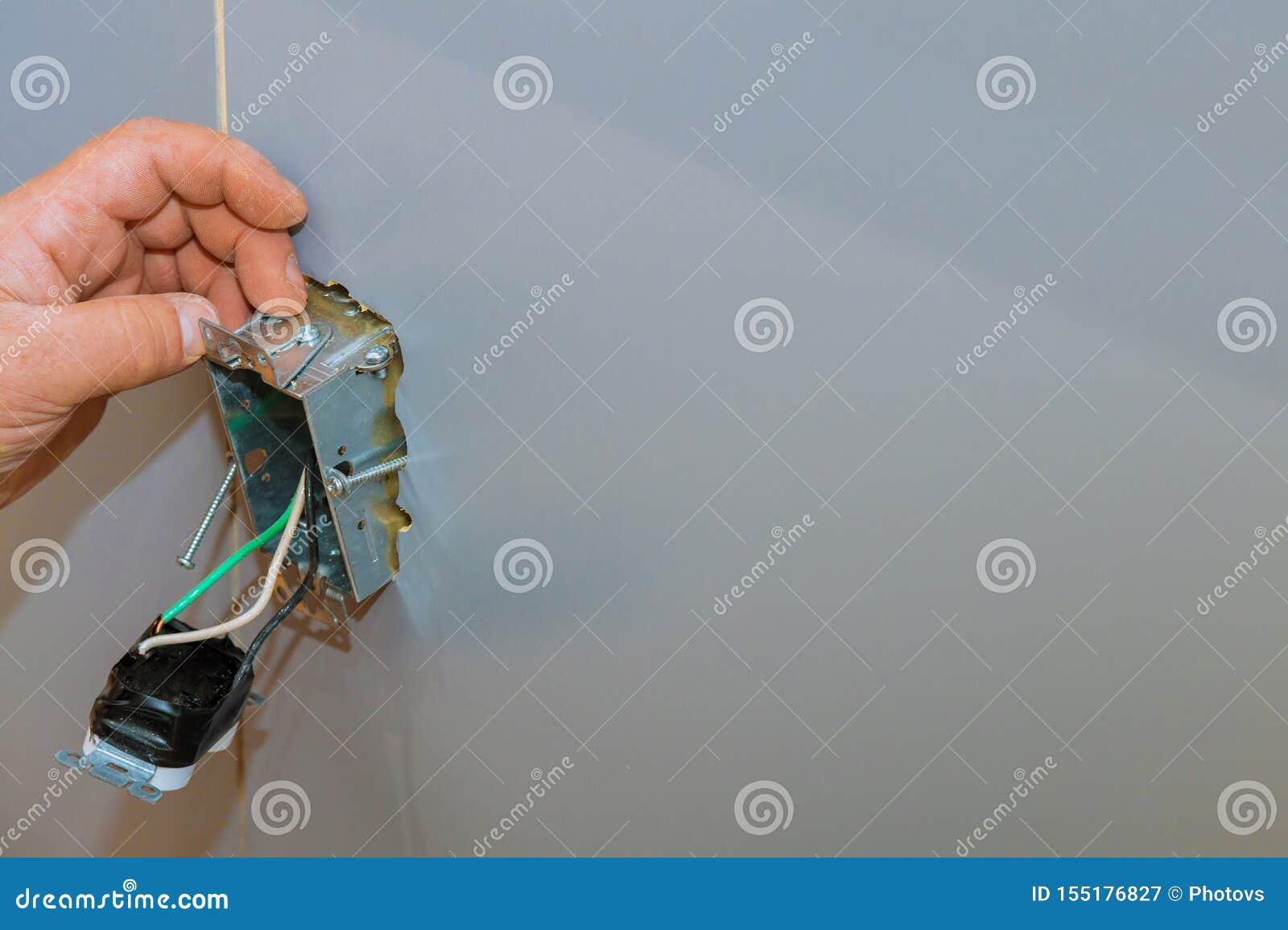 Installation of Electrical Sockets in Hand of Electrician Installing ...
