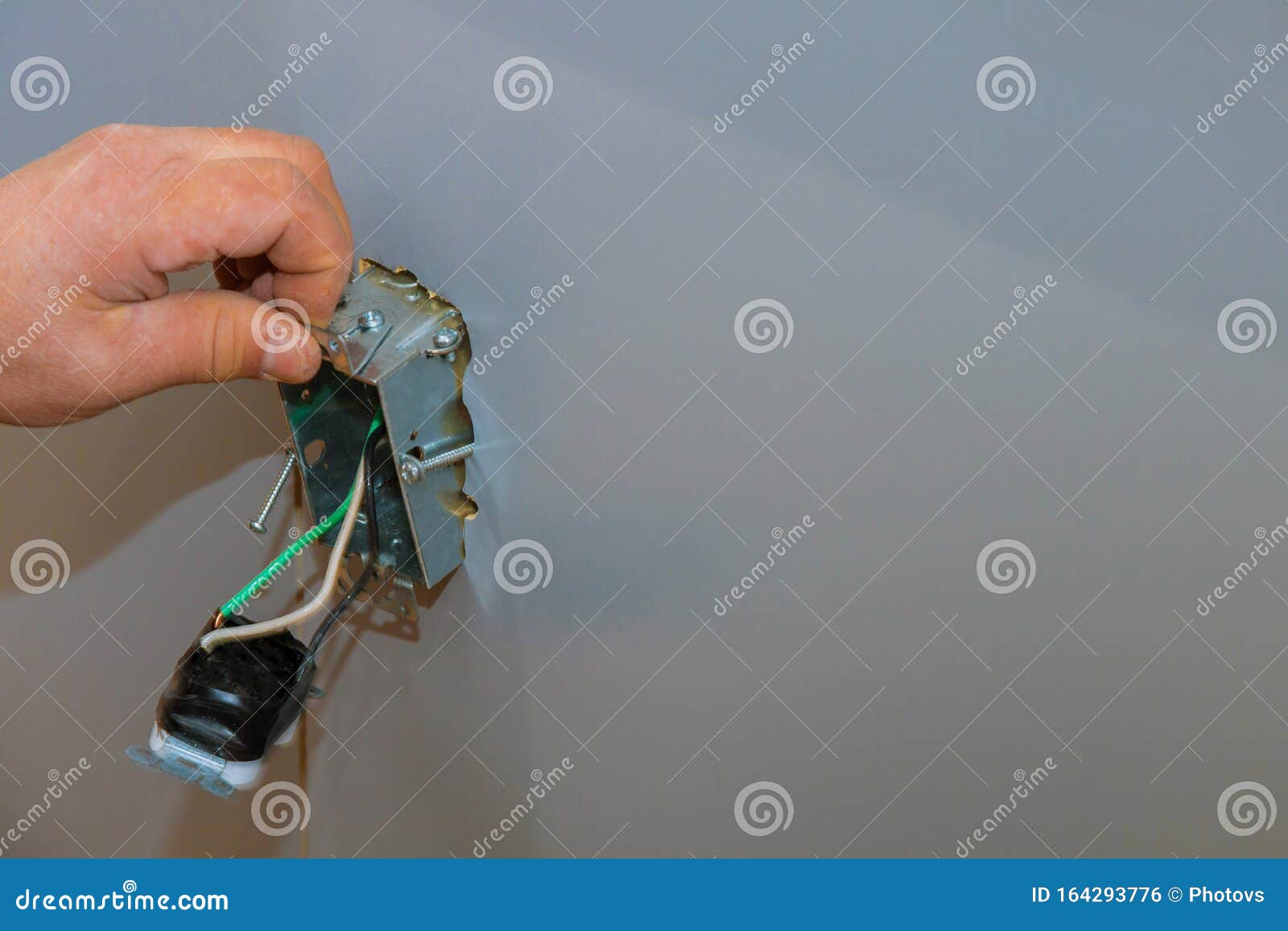 Installation of Electrical Sockets in Hand of Electrician Installing ...