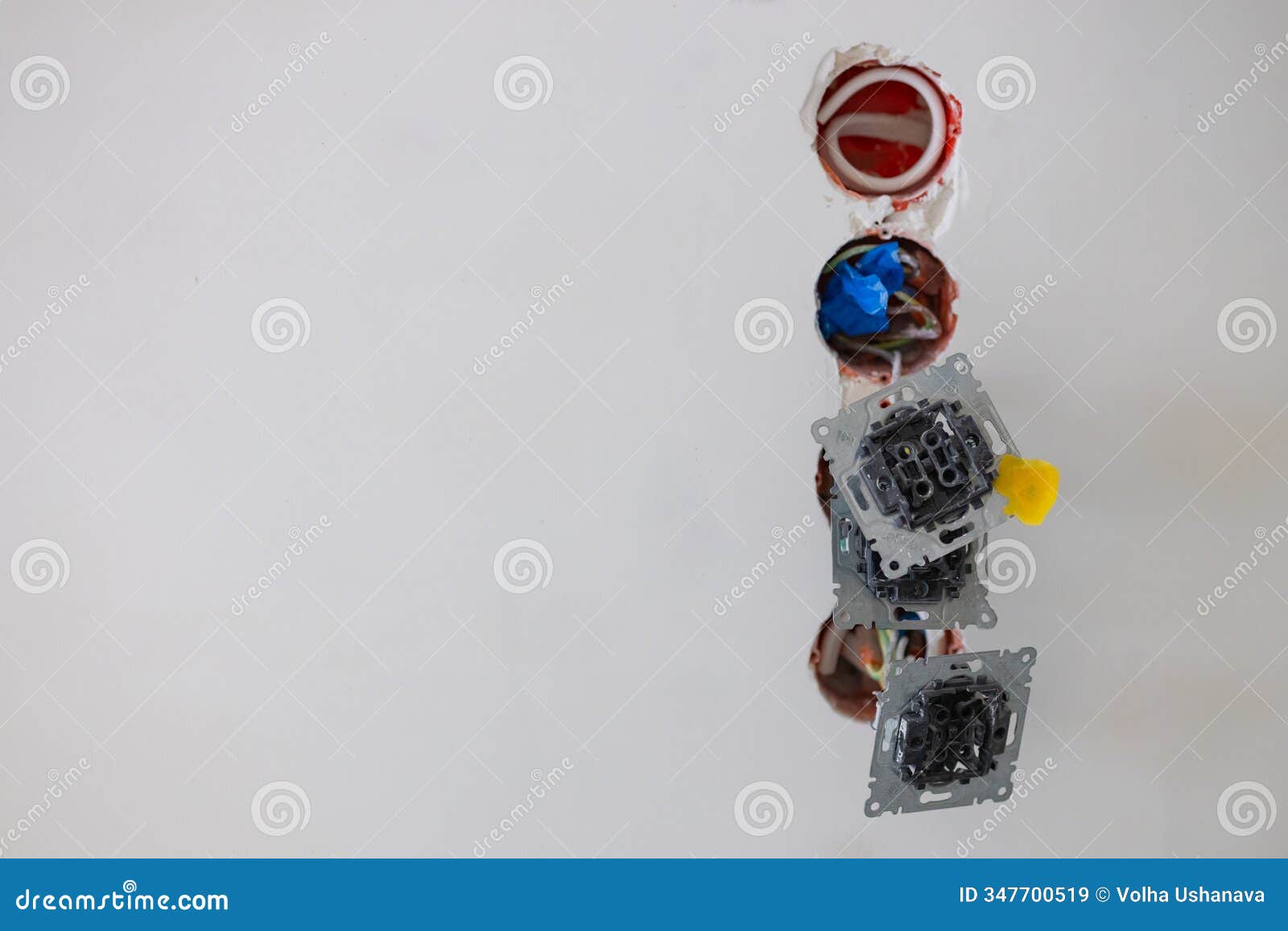 Installation Of Wires In A Fork. The Electrician Connects The Plug To ...