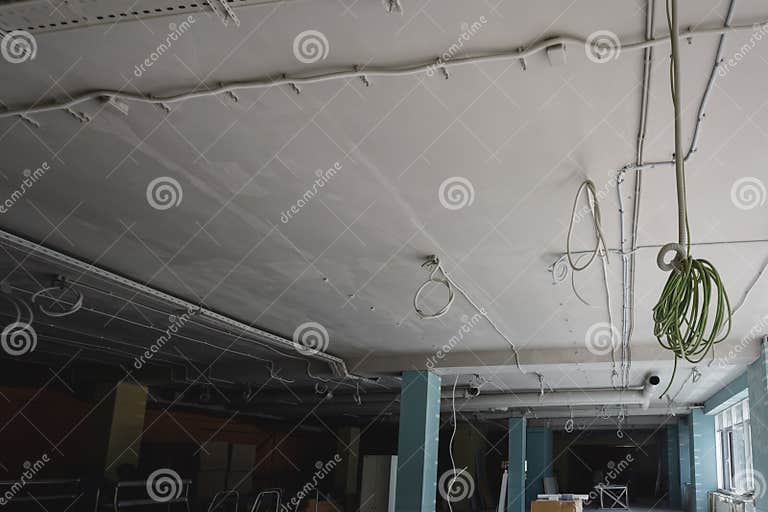 Installation of Electrical Wiring on the Ceiling. Electrical Cable ...