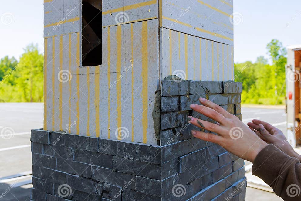 Installation of Facing Tiles on Building Columns by a Tiler Stock Image ...