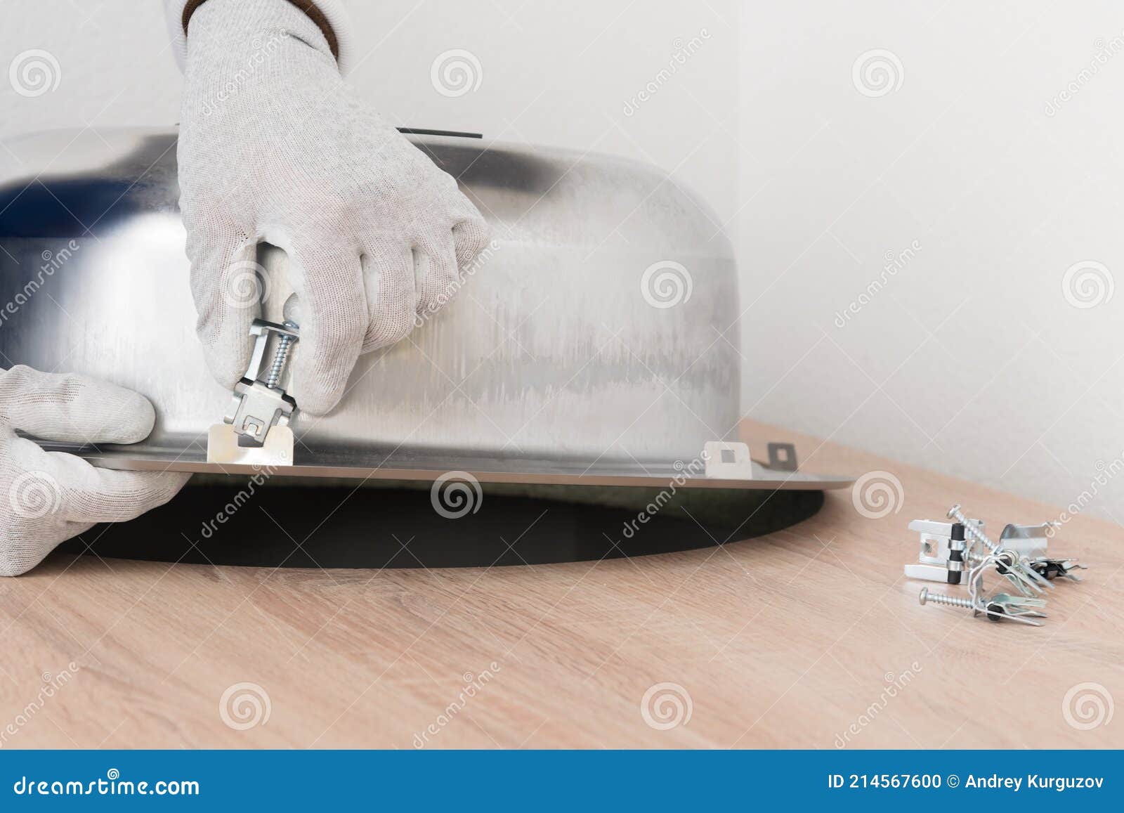Installation of Fasteners for the Sink for Installation in the Kitchen ...
