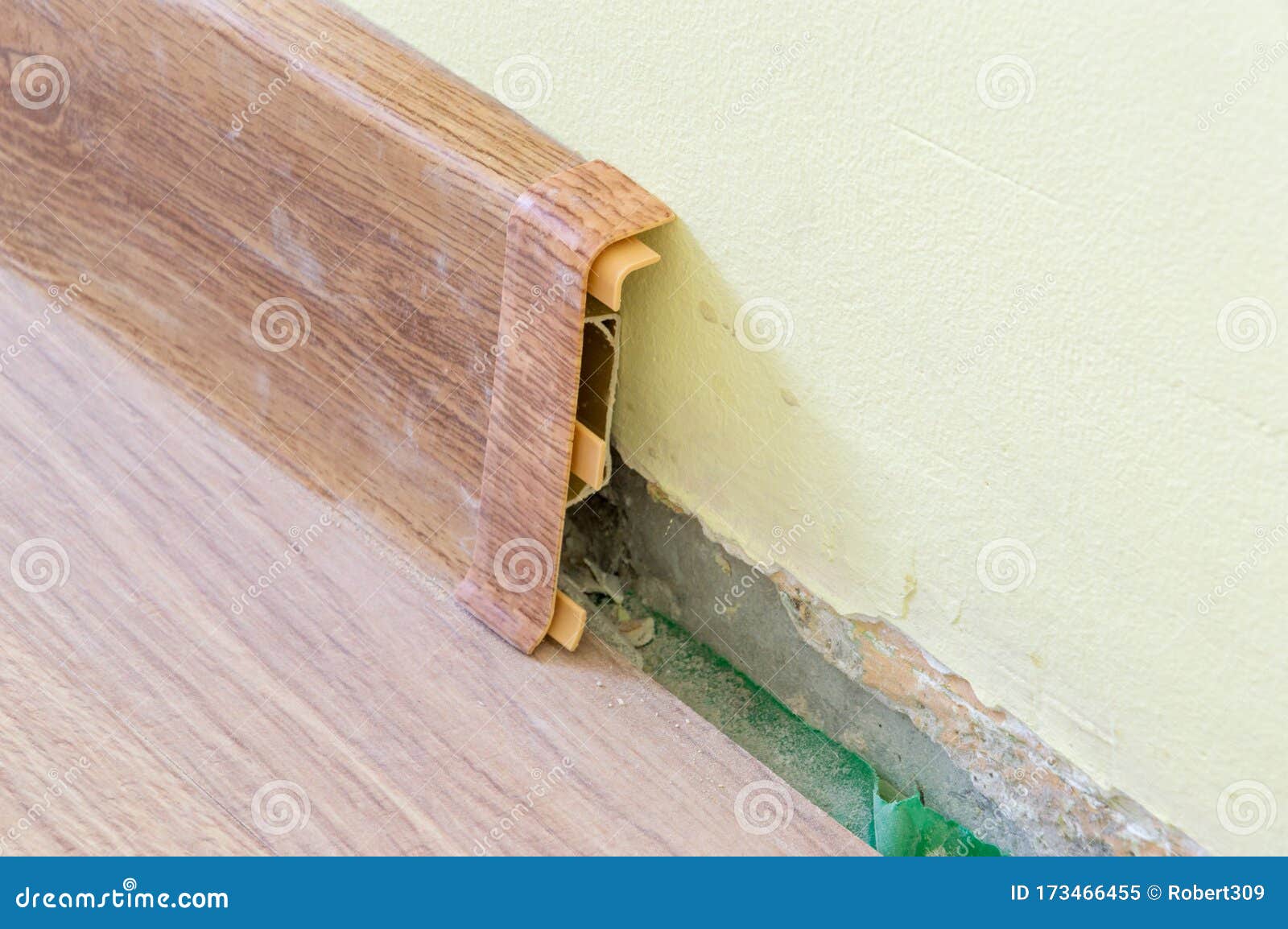 Installation of Floor Plastic Skirting Boards. Stock Image - Image of ...